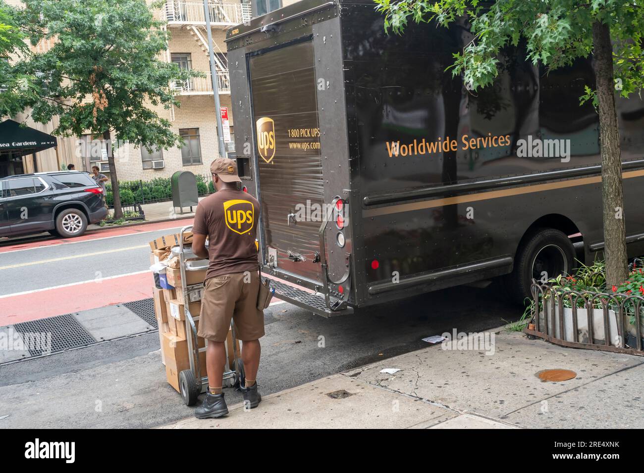 UPS driver prepares deliveries in Chelsea in New York on Tuesday, July ...