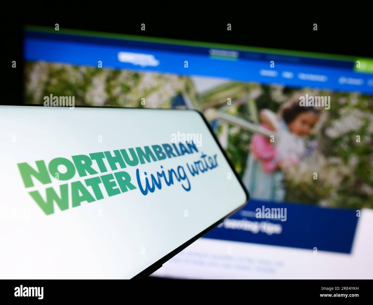 Mobile phone with logo of British company Northumbrian Water Limited on ...