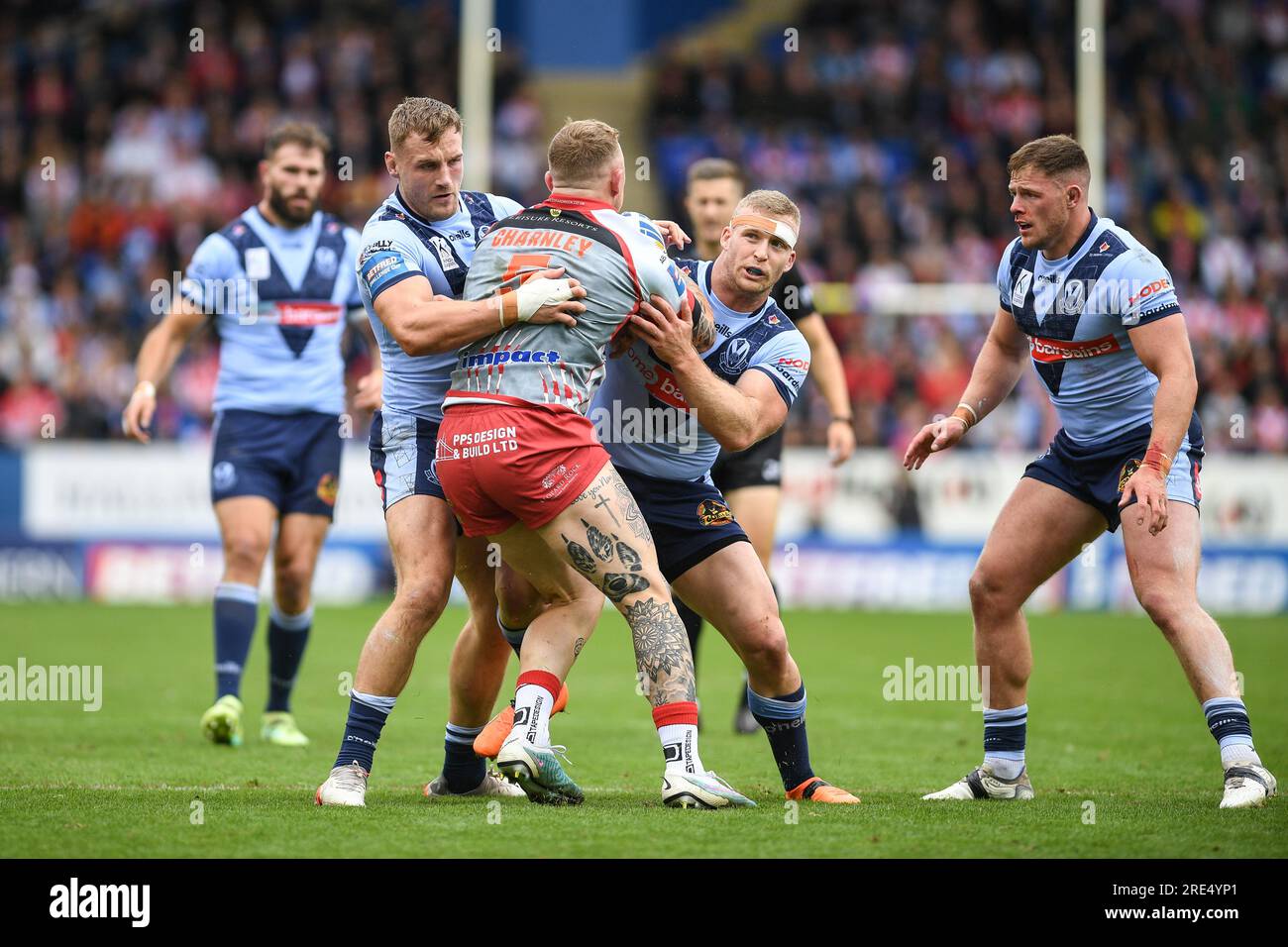 Warrington, England - 22nd July 2023 - Josh Charnley of Leigh Leopards runs into St. Helens ...