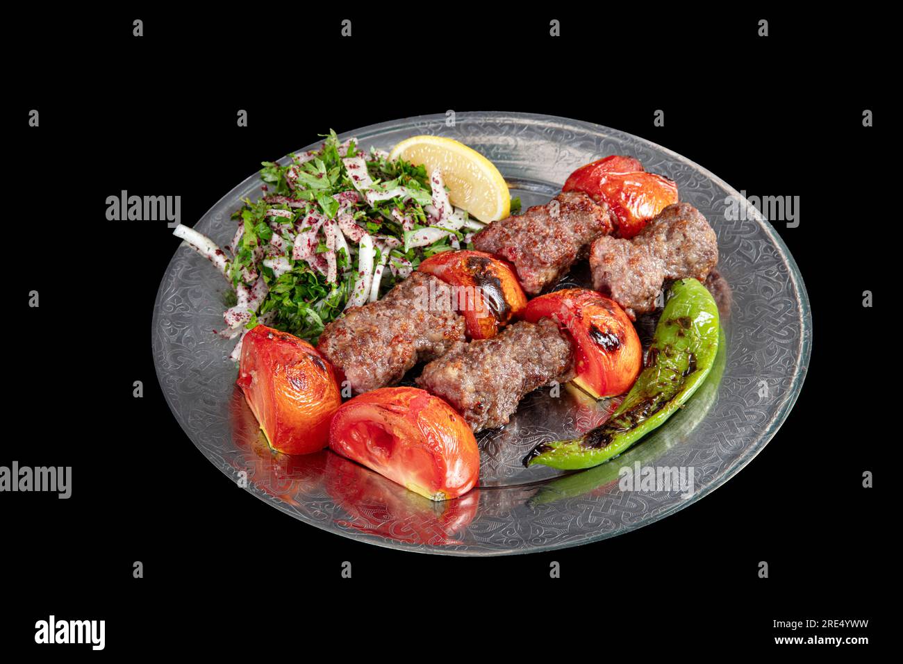 Turkish cuisine tomato kebab. Tomato kebab, domates kebab with grilled ...