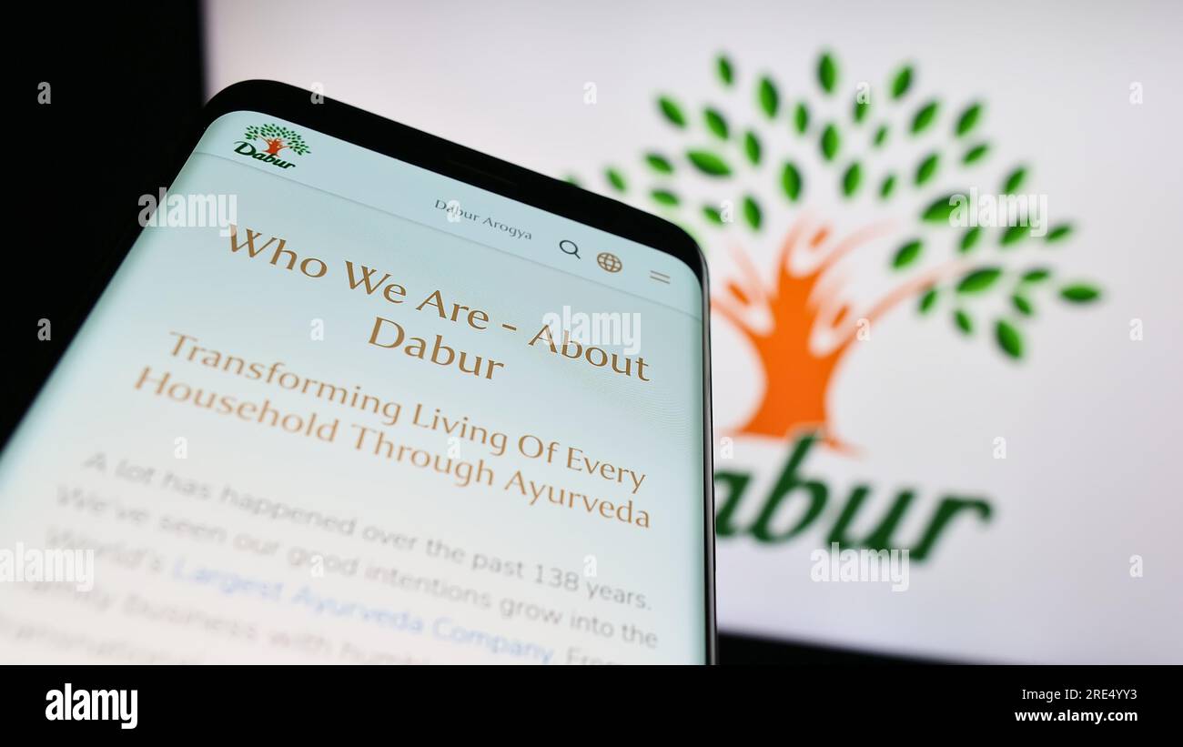 Smartphone with website of Ayurveda company Dabur India Limited on ...