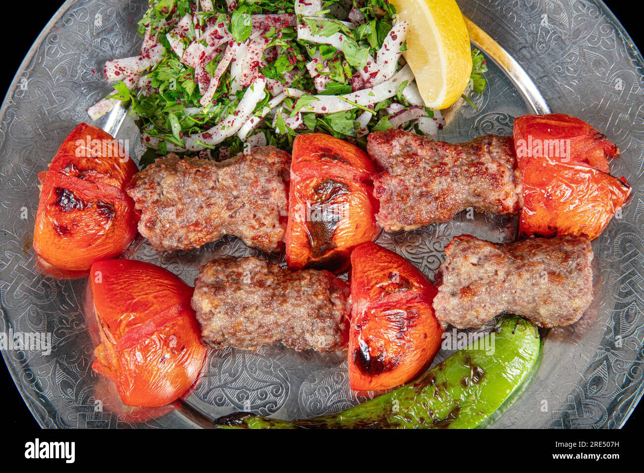 Turkish cuisine tomato kebab. Tomato kebab, domates kebab with grilled ...