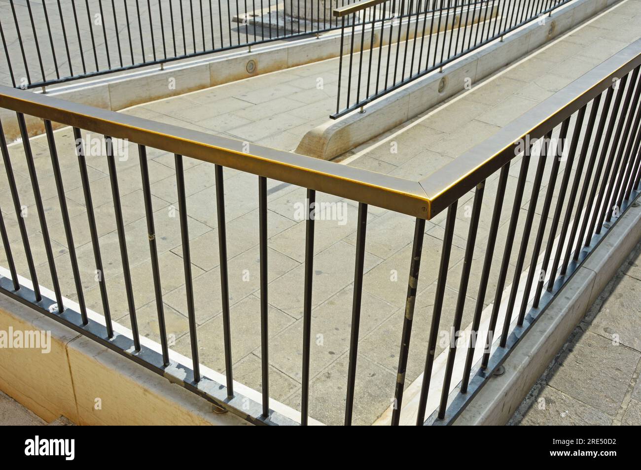 A ramp for the disabled near the stairs of the pedestrian area Stock ...