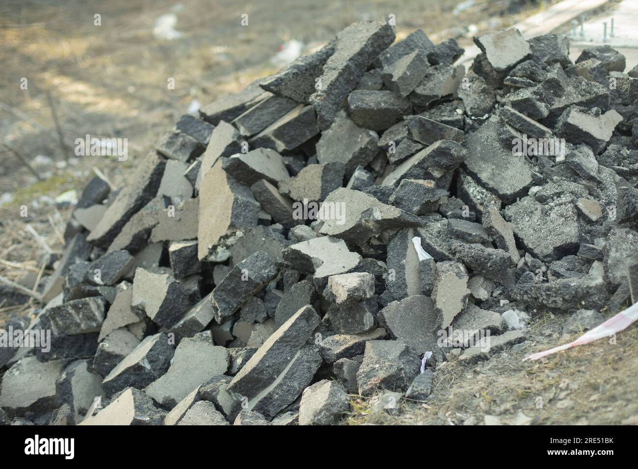 Broken asphalt. Preparation of work. Pieces of asphalt. Debris Stock ...