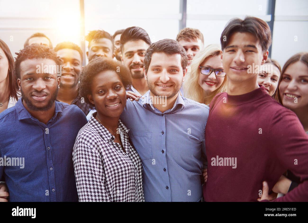 Large Group of people standing together in studi Stock Photo - Alamy