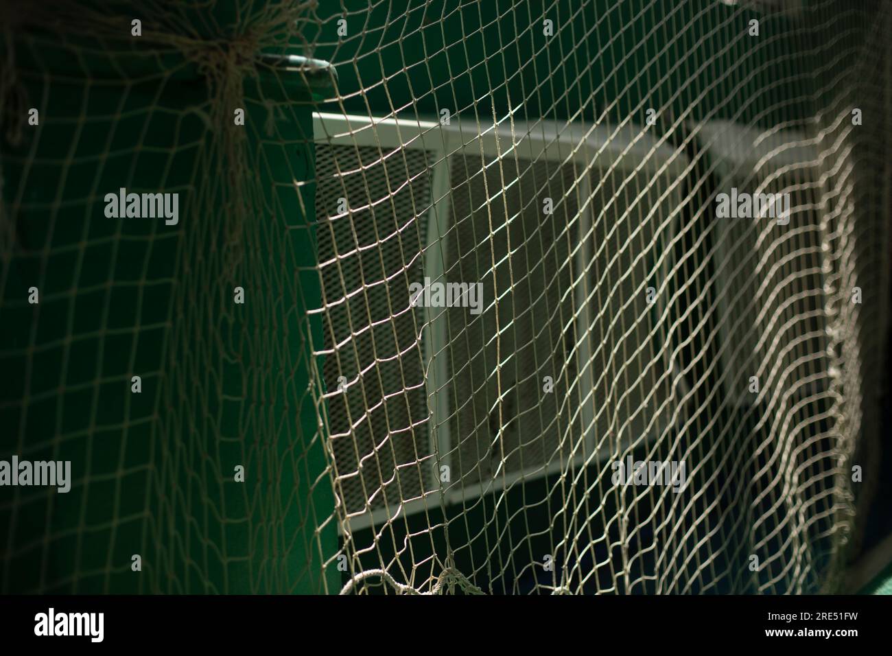 Net in gym. Mesh Details. Light in gym. Interior details Stock Photo ...