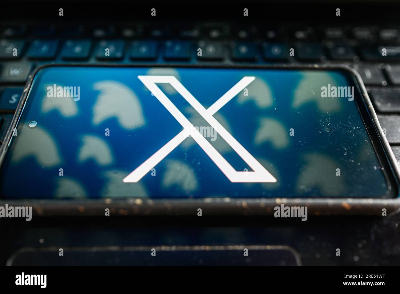 In this photo illustration, a New twitter Logo X is displayed on a ...