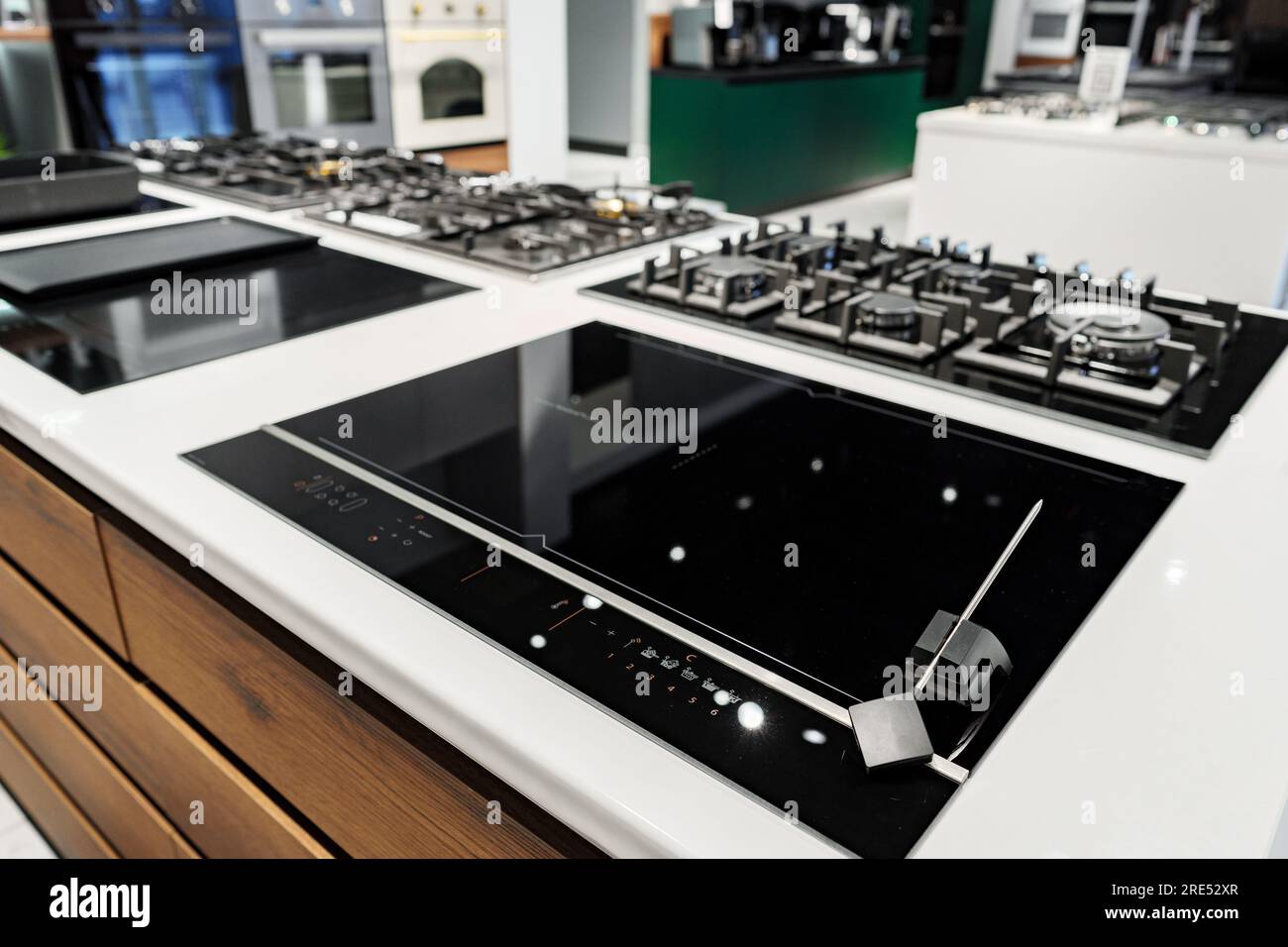 Modern cooking stoves on display in the store Stock Photo - Alamy