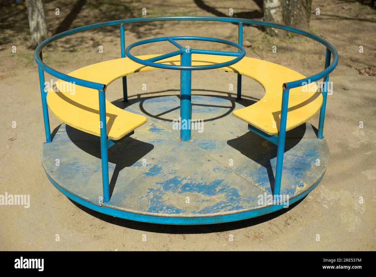 Carousel on playground. Empty playground. Attraction for toddlers. Play ...