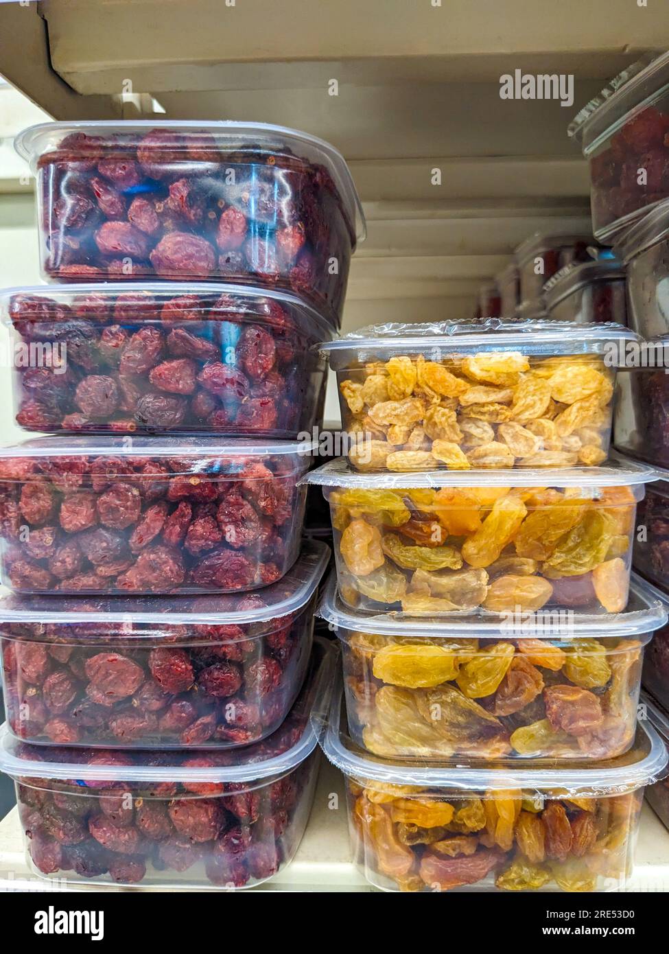 Freeze-dried cherries and raisins in plastic containers in the ...