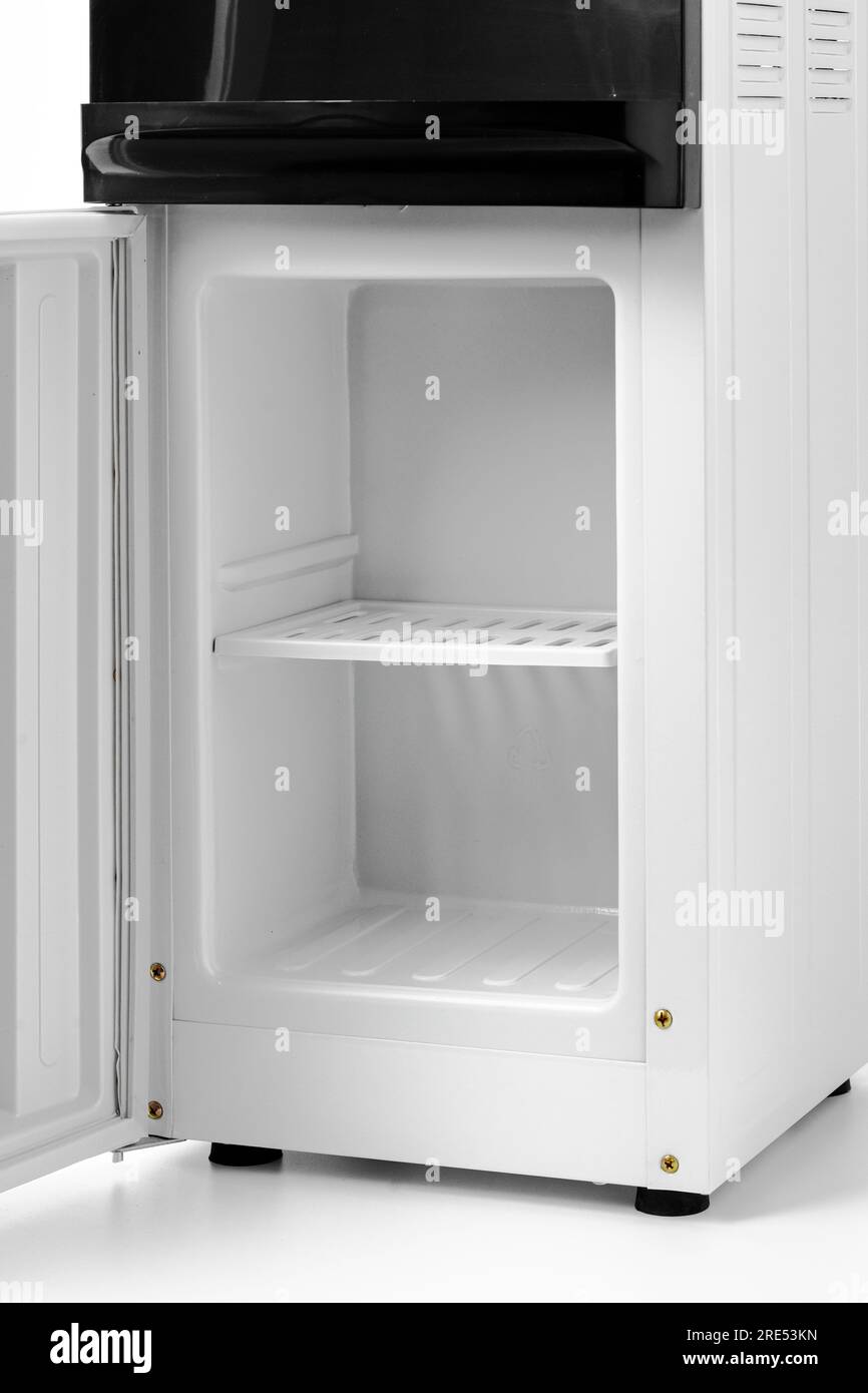 Open empty mini fridge isolated on white background Stock Photo - Alamy