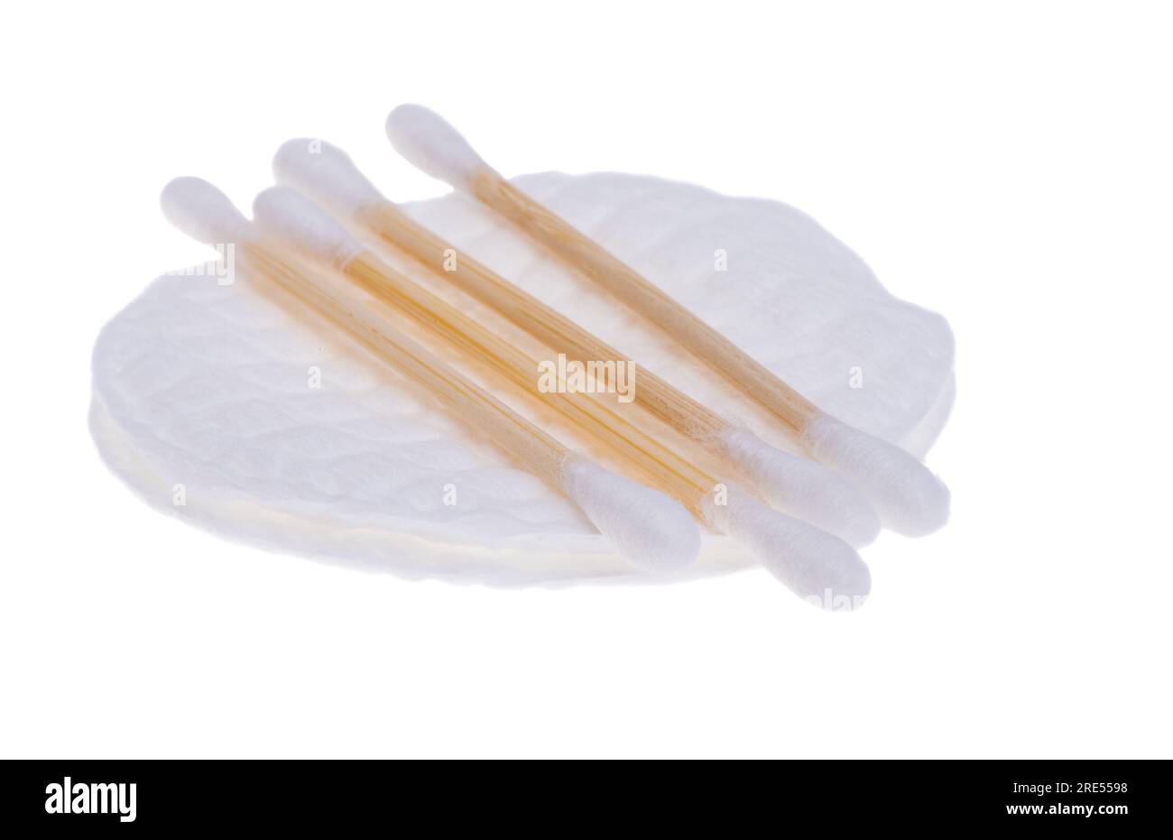 cotton pad and sticks isolated on white background Stock Photo - Alamy