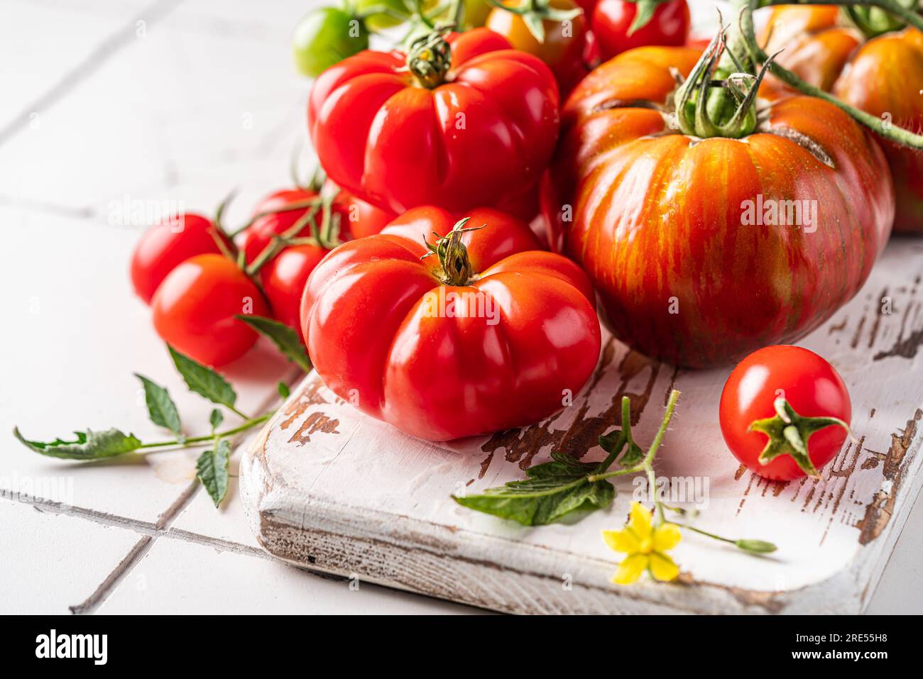 Mix red tomatoes Stock Photo - Alamy