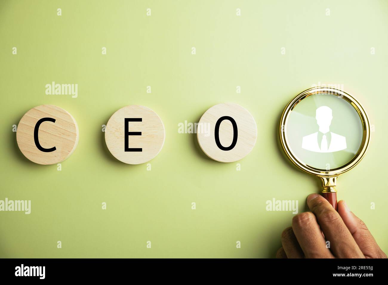 Human resources officer uses magnifying glass to find leader and CEO ...
