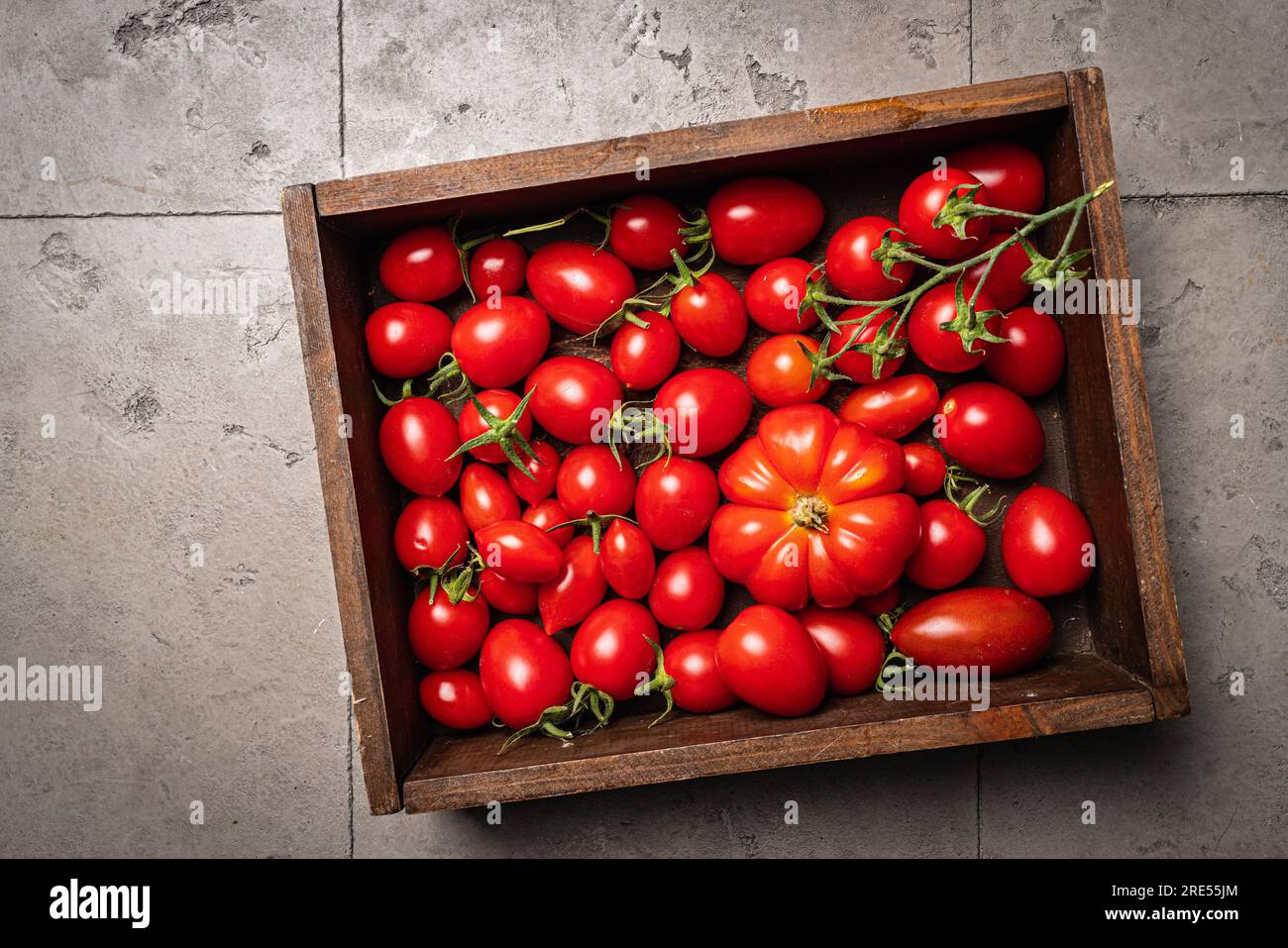 Mix red tomatoes Stock Photo - Alamy