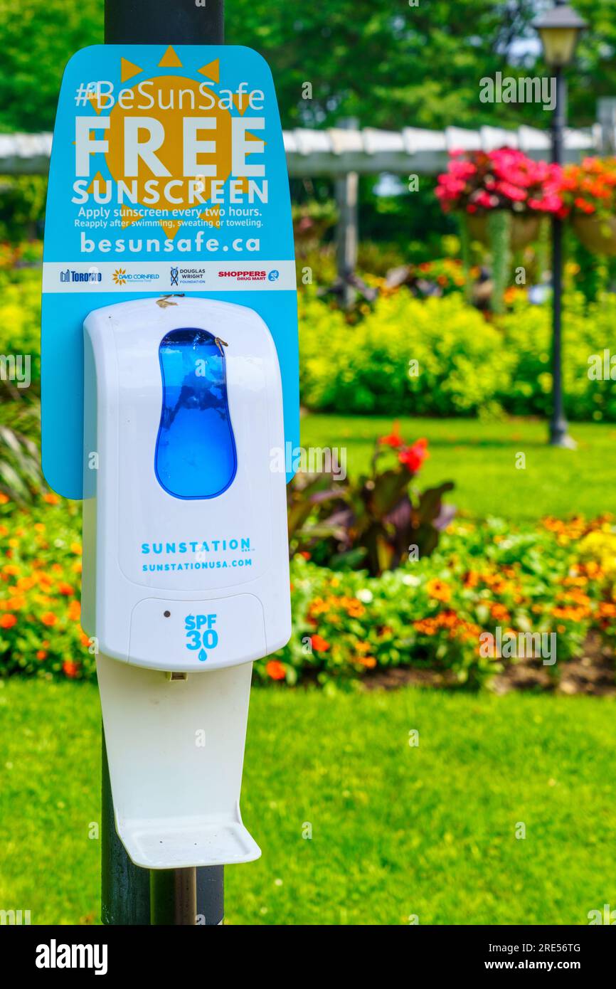 Toronto, Canada - July 23, 2023: Free sunscreen cream dispenser, a ...