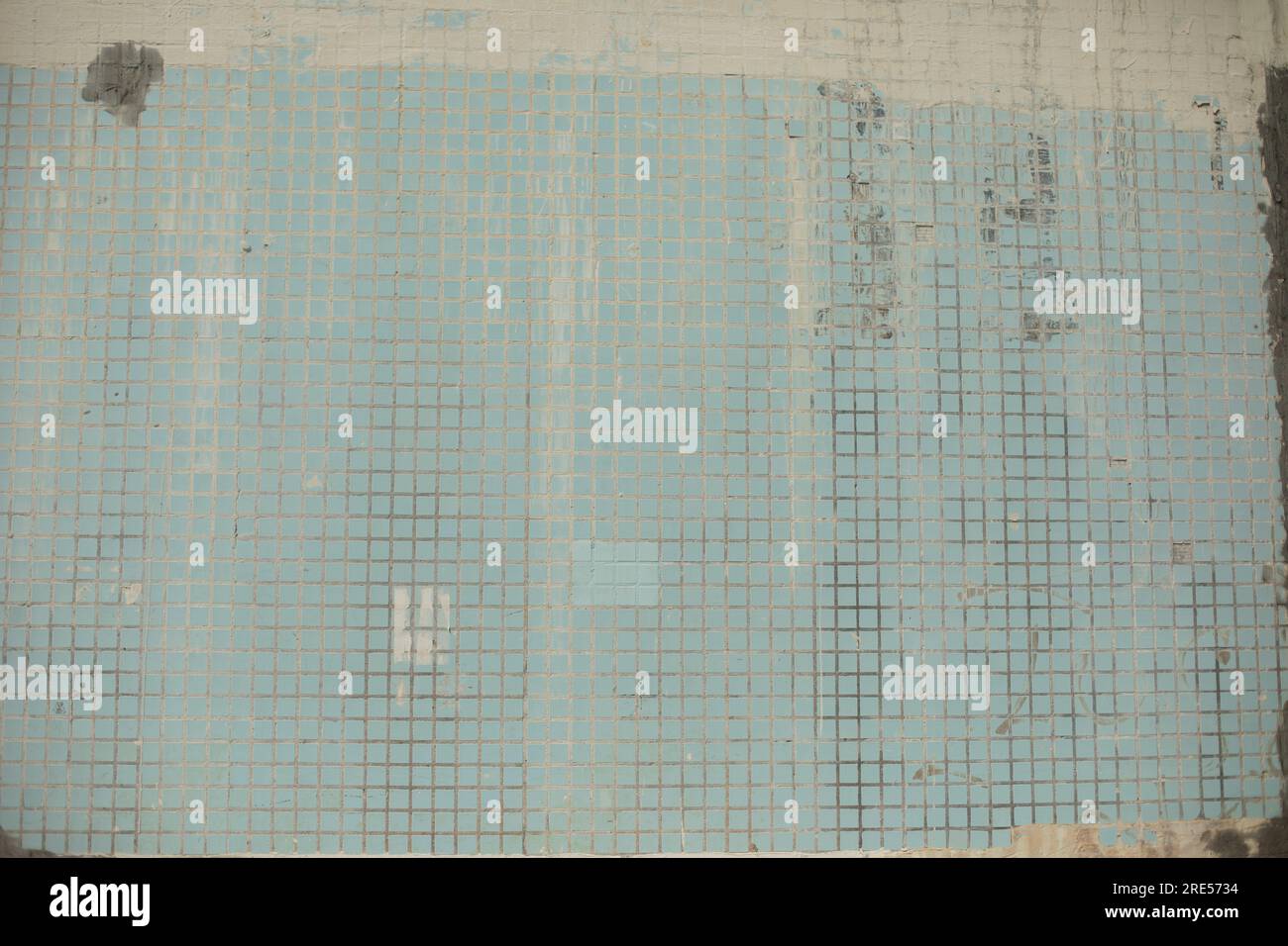 Old wall of building. Small tile wall. Tiles in cladding of building ...