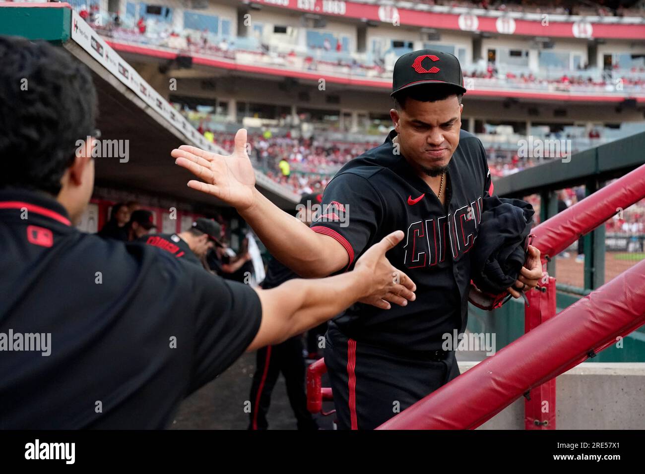 Cincinnati Reds relief pitcher Fernando Cruz leaves the dugout prior to ...