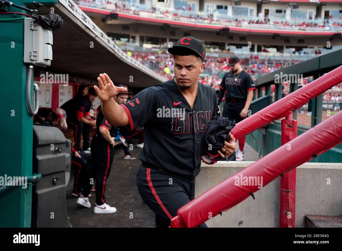 Cincinnati Reds relief pitcher Fernando Cruz leaves the dugout prior to ...