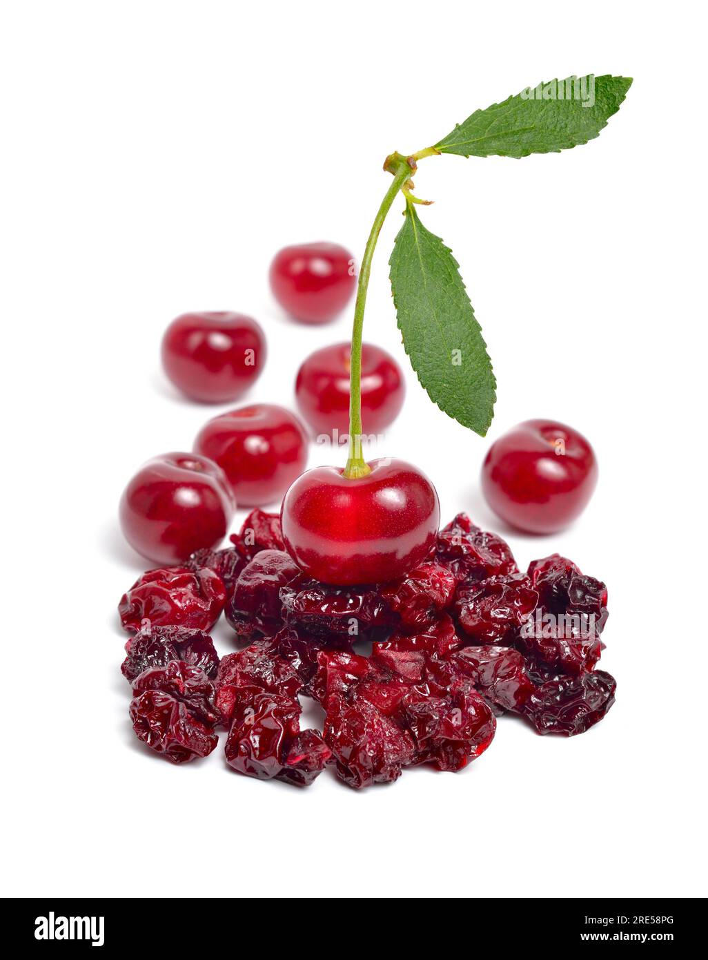 Dried cherry heap isolated on white background Stock Photo - Alamy