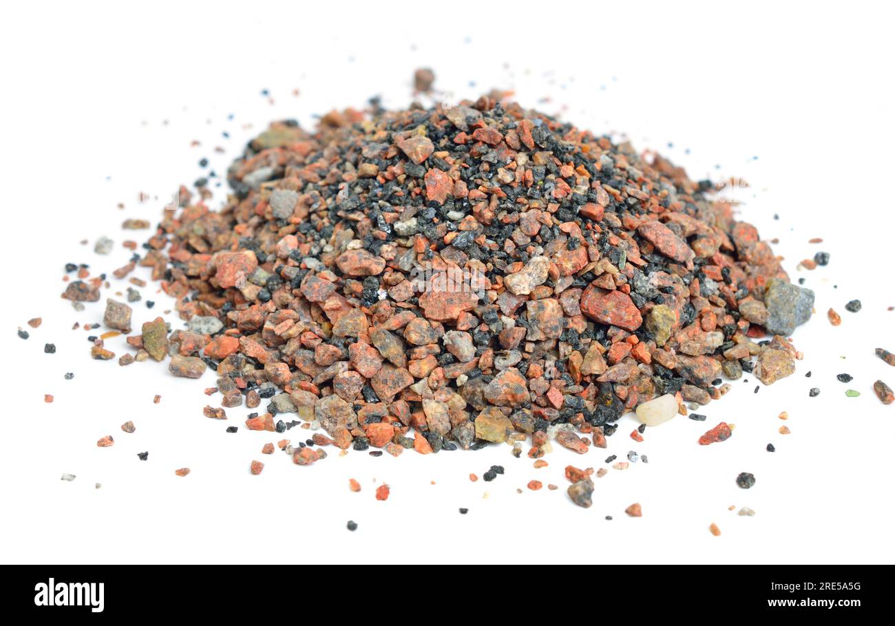 Pile of granite screenings. Isolated on white background Stock Photo ...