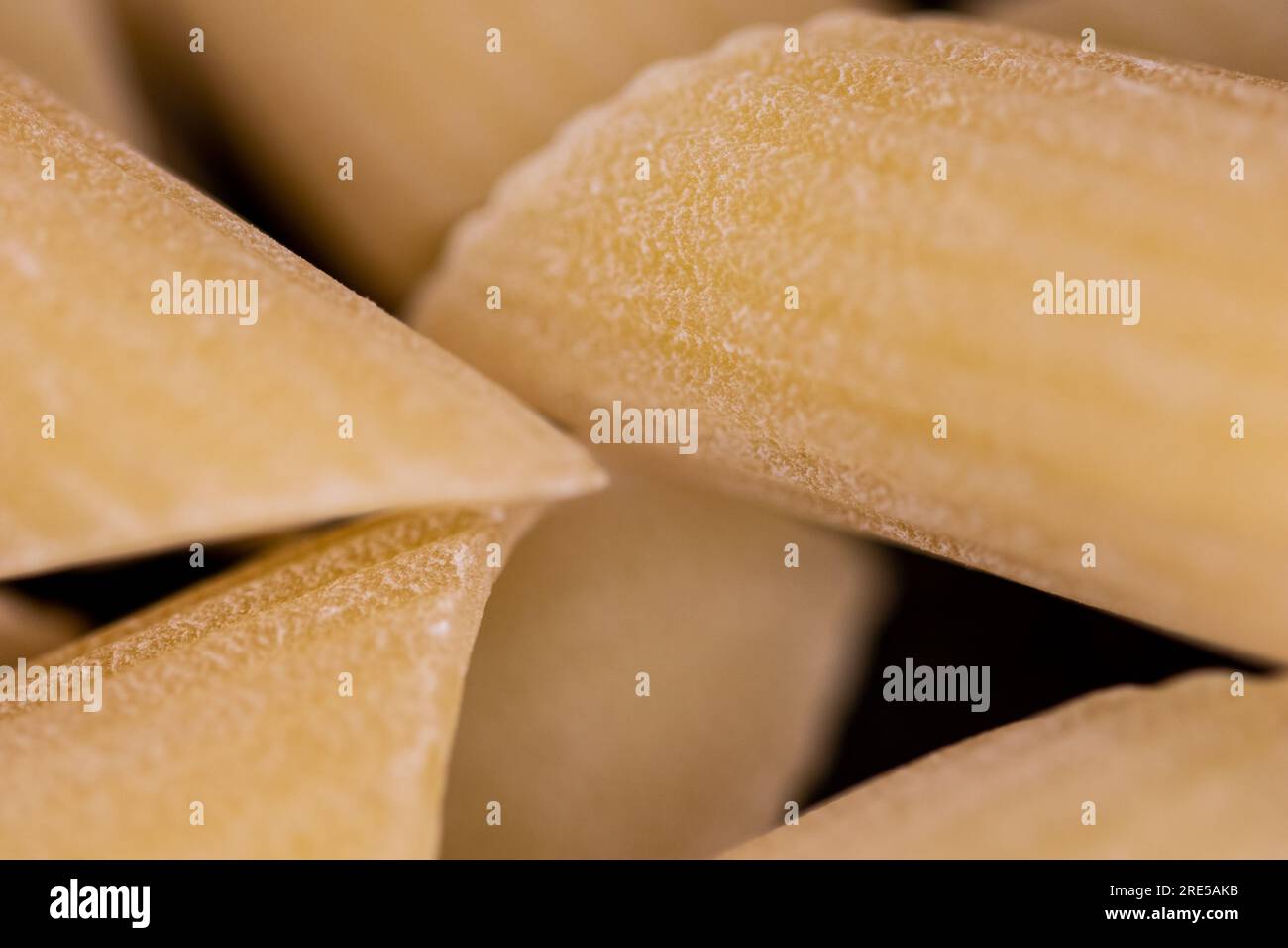 Penne pasta close up. Detail of famous kind of pasta Stock Photo - Alamy