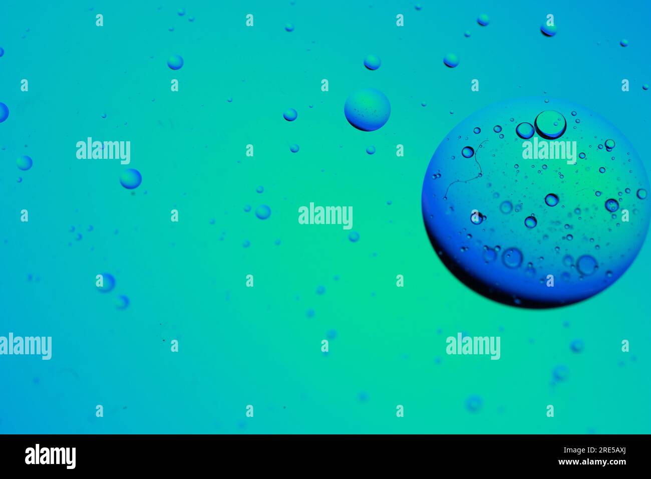 Abstract science concept background with oil drop in water ...