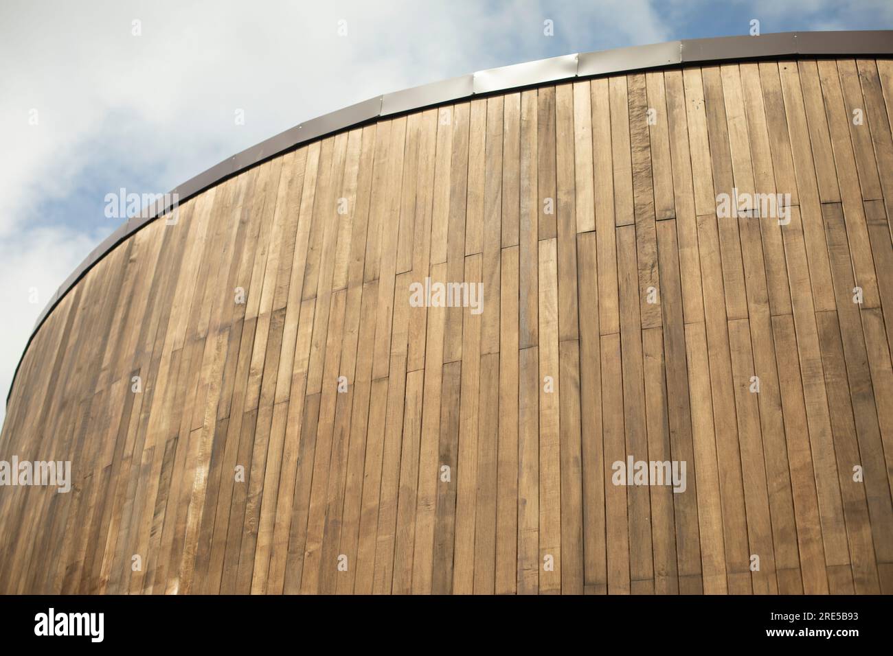 Wooden wall of modern building. Details of building. Construction of ...