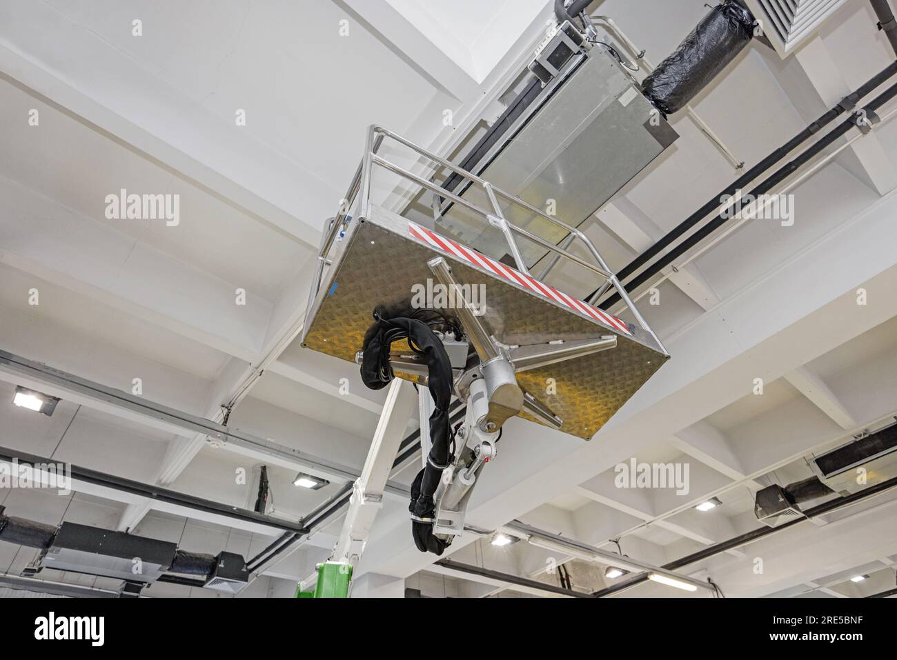 Basket Crane Aerial Platform in Hall Ceiling Works Stock Photo - Alamy
