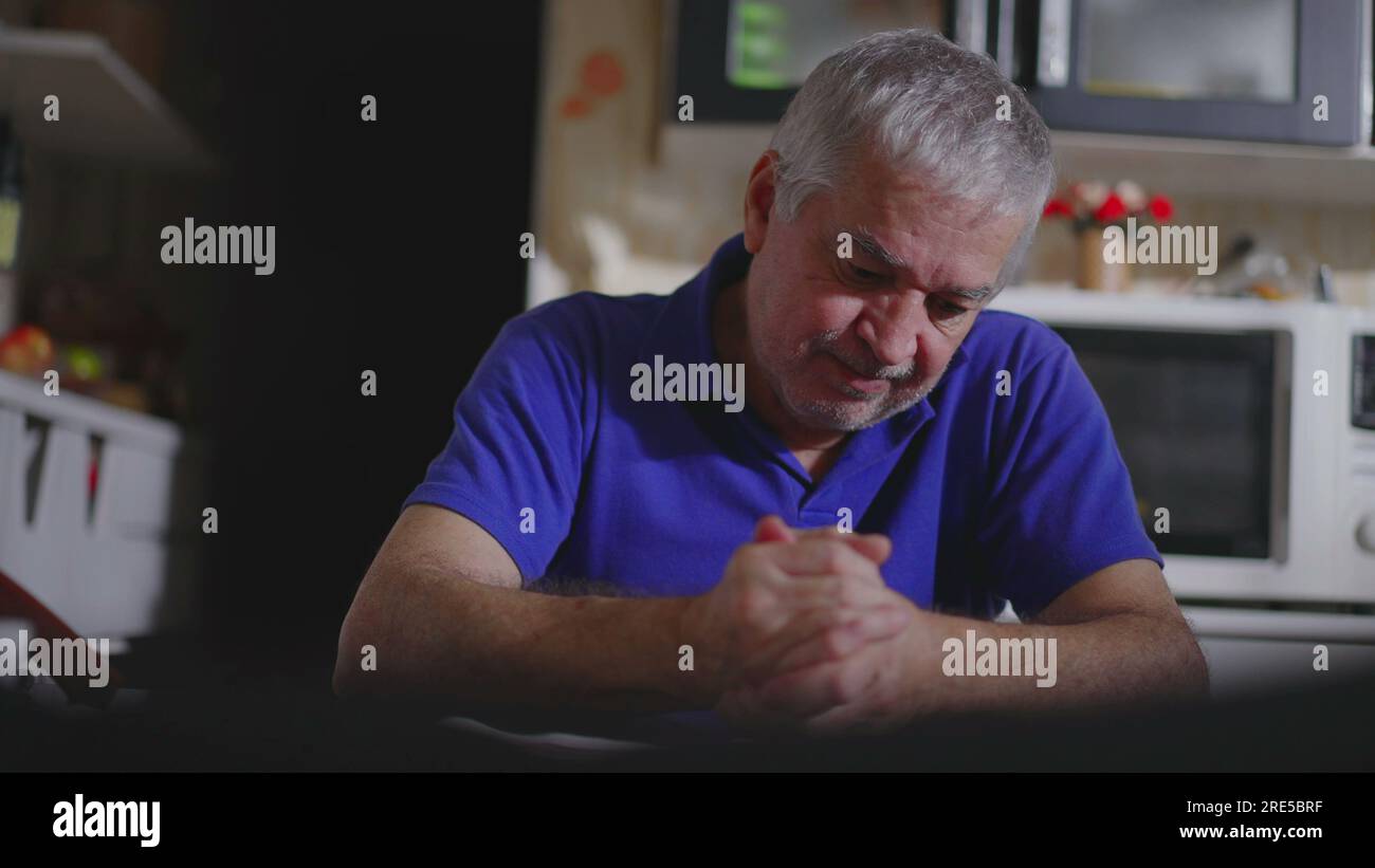 Melancholic Elderly Individual Sitting Alone at Kitchen Table, Senior ...