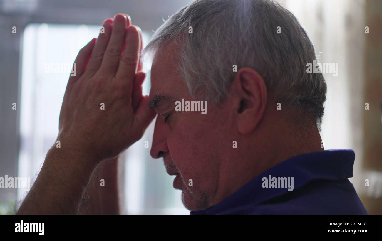 Religious Elderly man in PRAYER, devout Spiritual Older person having ...