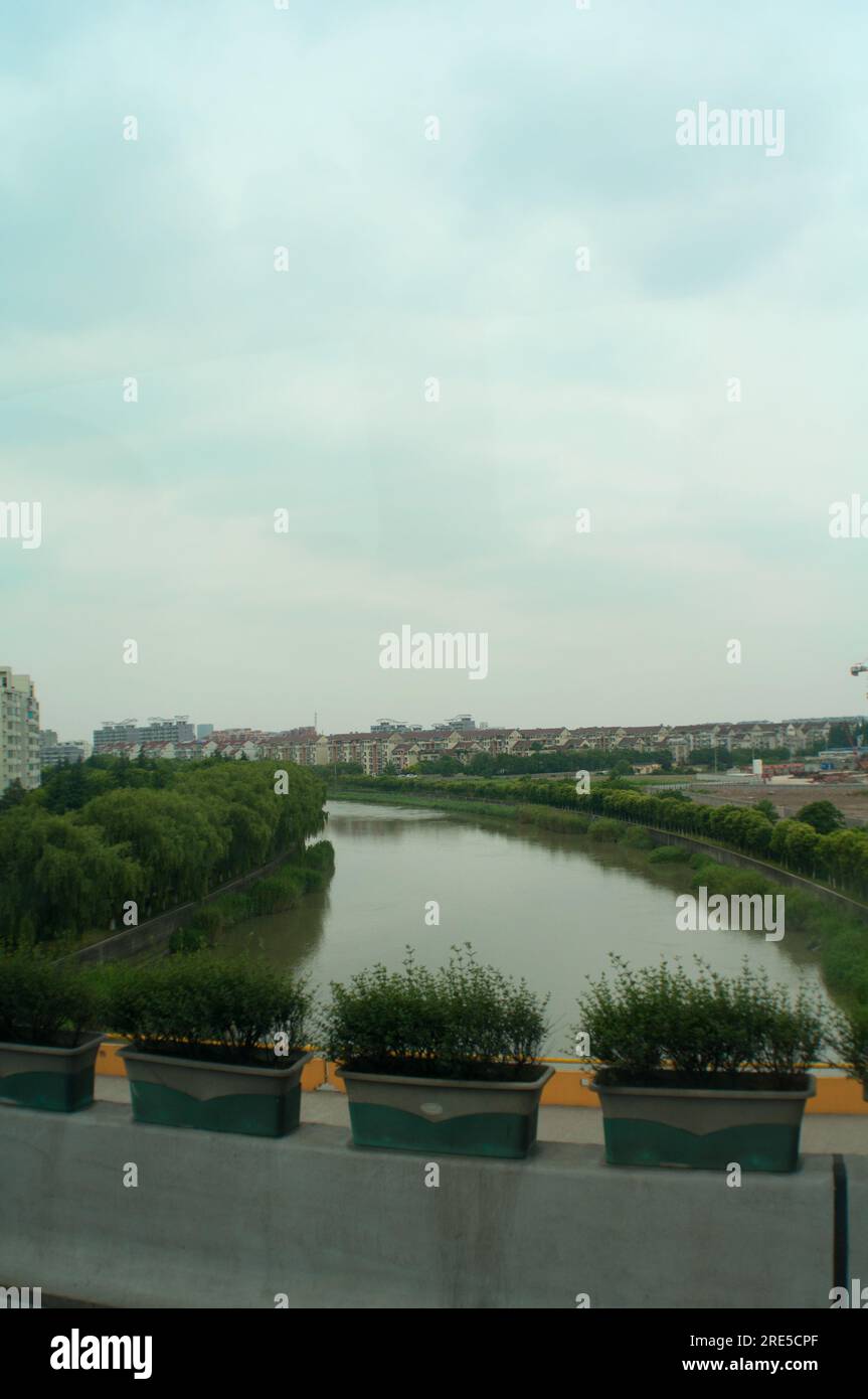 Planter Box Lined Bridge, Water, & Blue Sky Stock Photo - Alamy