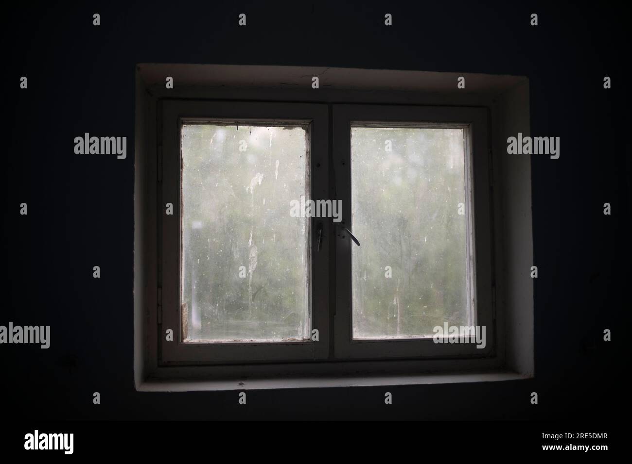 Window in building. Interior details. Window in dark room. Cloudy glass ...
