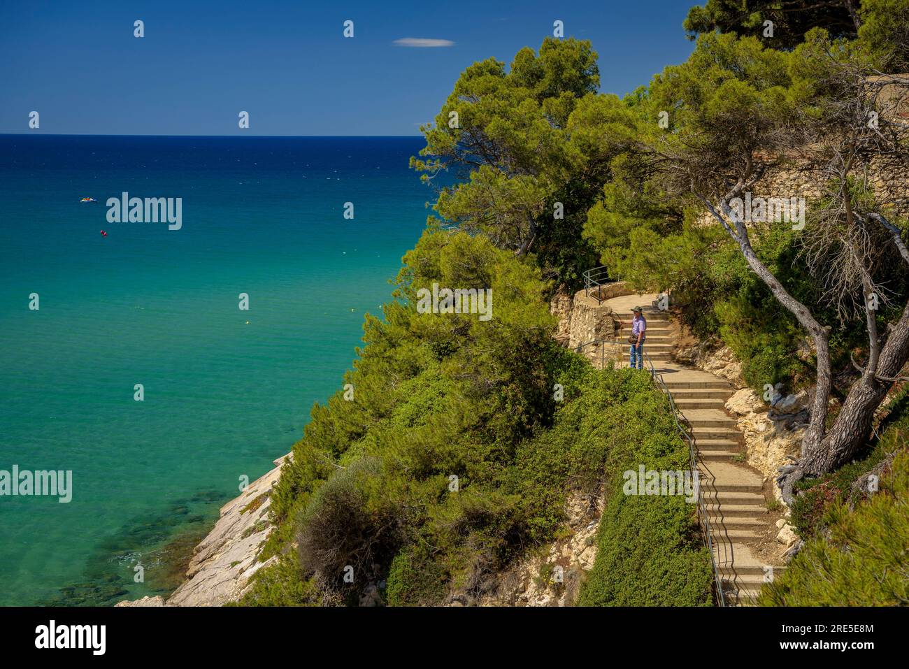 View of some stairs of the coastal path (Camí de ronda) in Salou, on ...