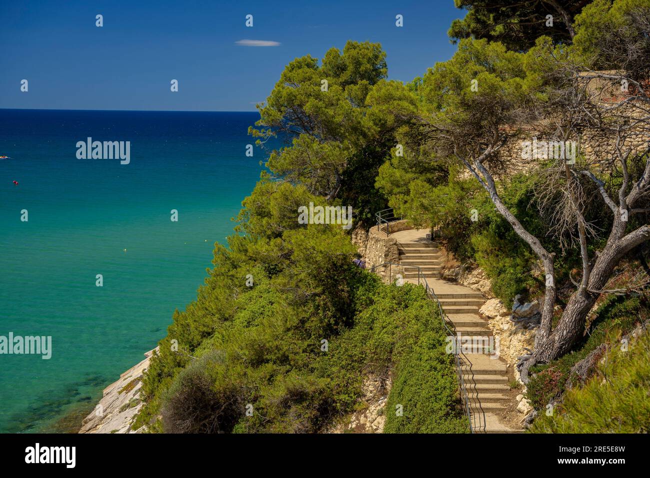 View of some stairs of the coastal path (Camí de ronda) in Salou, on ...
