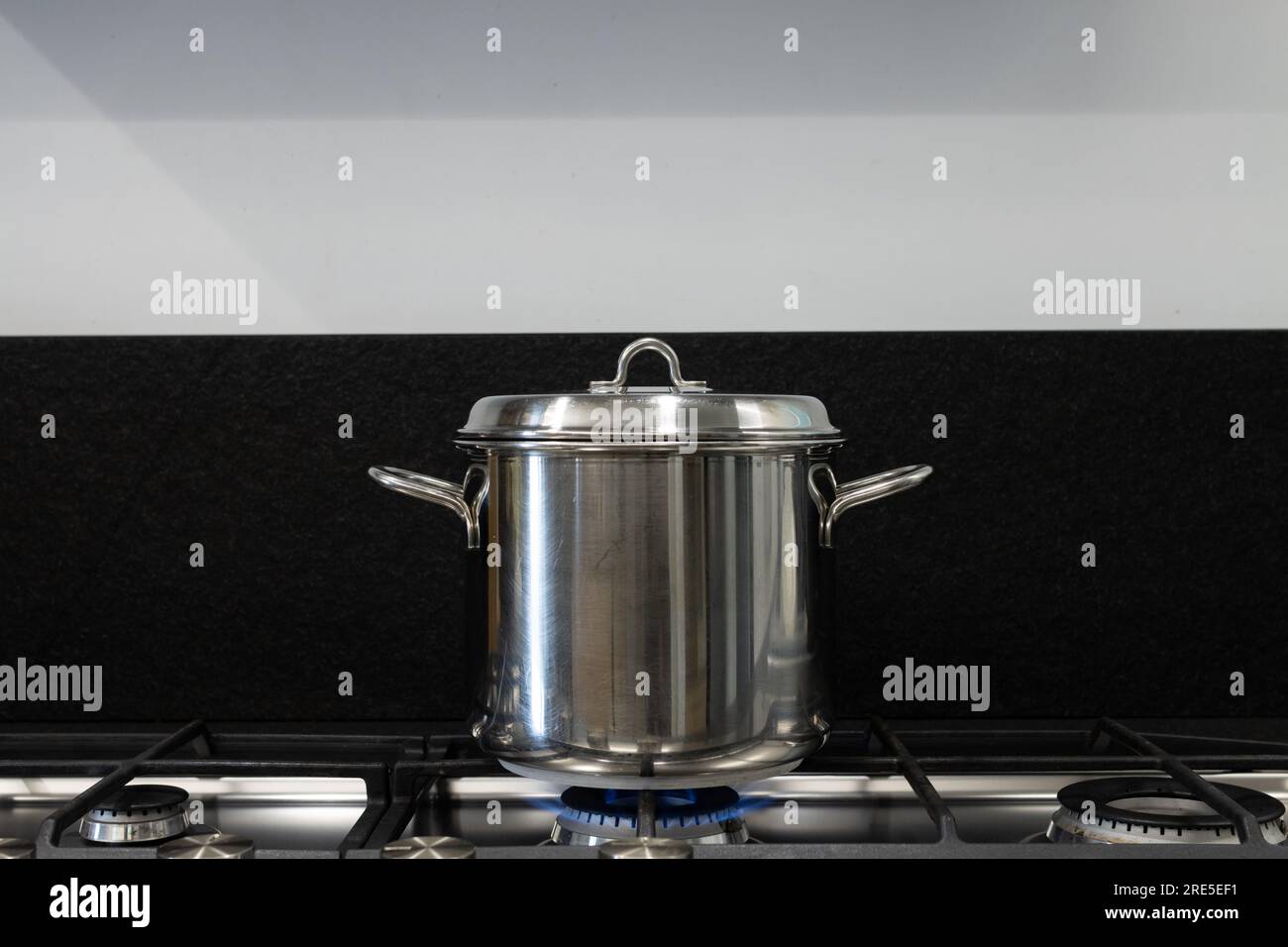 Cover a pot you are cooking with with a lid. Steel pot comes covered ...