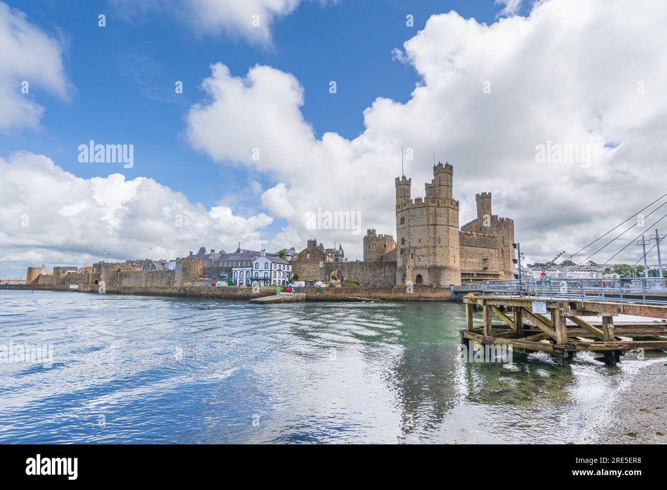 Caernarfon Castle and the Aber swing bridge over the River Seiont and ...