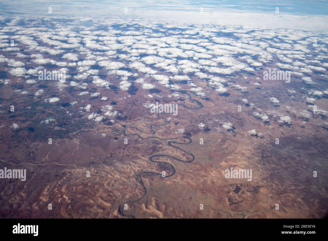 Aerial view from airplane during international flight. Travel in ...