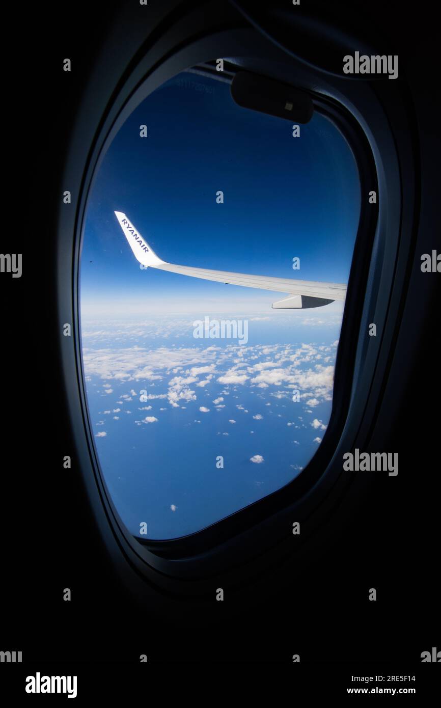 Clouds in the sky during airplane travel. Panorama of the clouds and ...