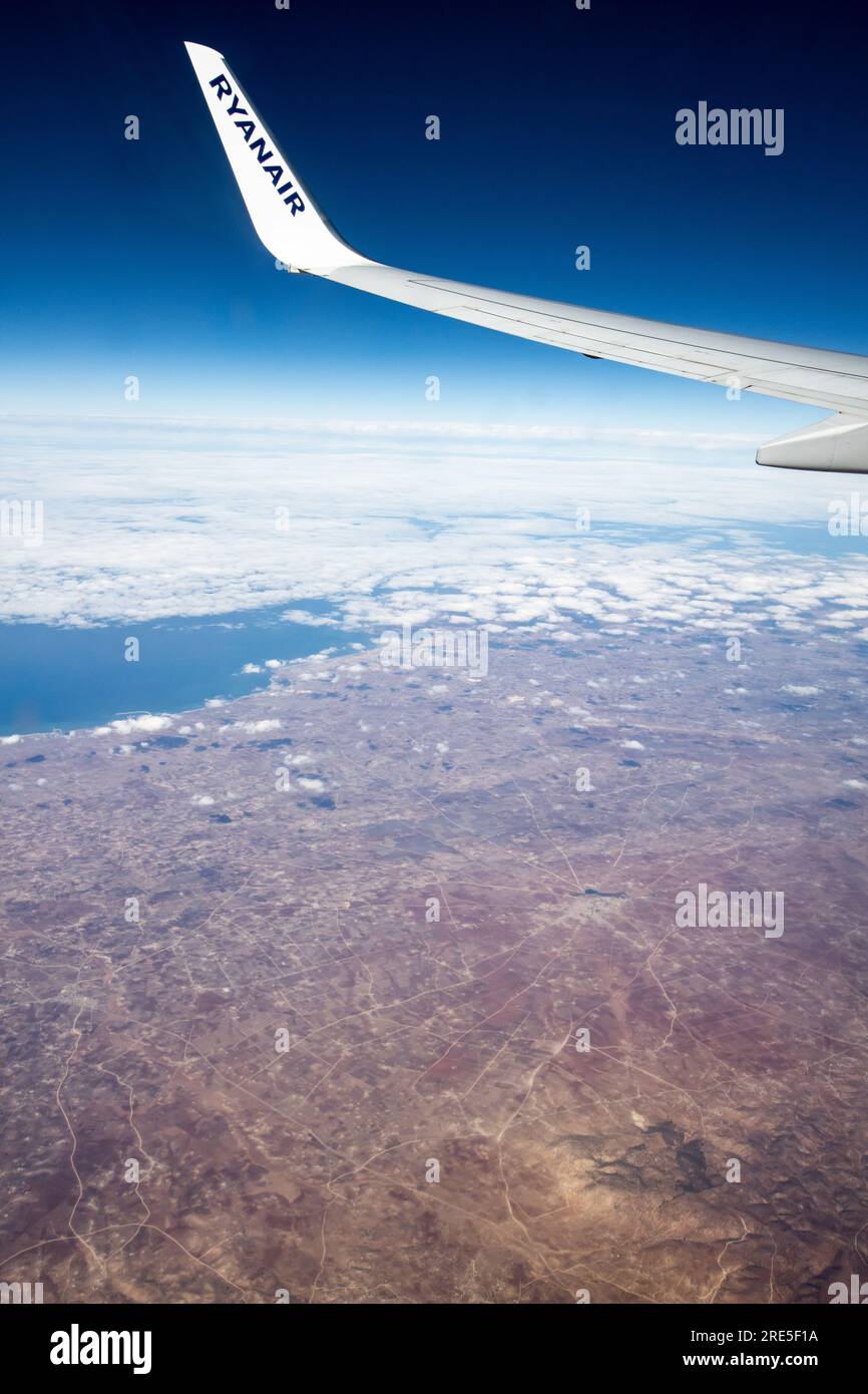 Clouds in the sky during airplane travel. Panorama of the clouds and ...