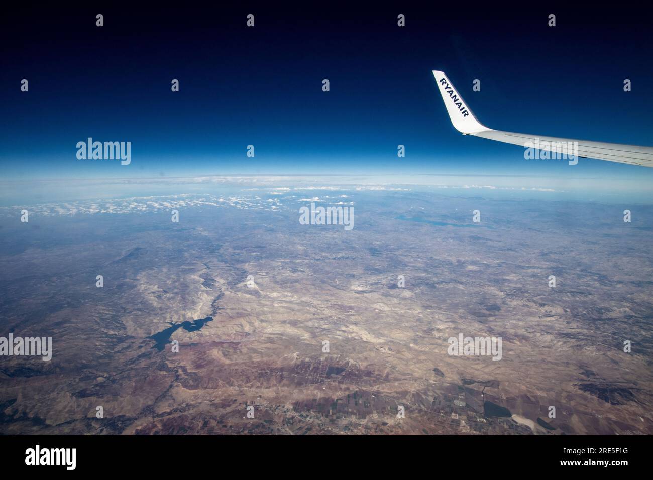 Clouds in the sky during airplane travel. Panorama of the clouds and ...