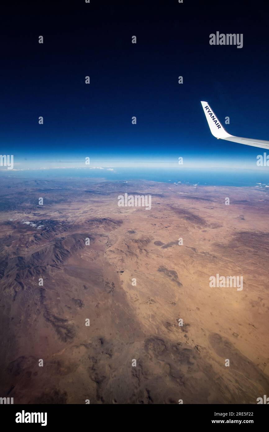 Clouds in the sky during airplane travel. Panorama of the clouds and ...