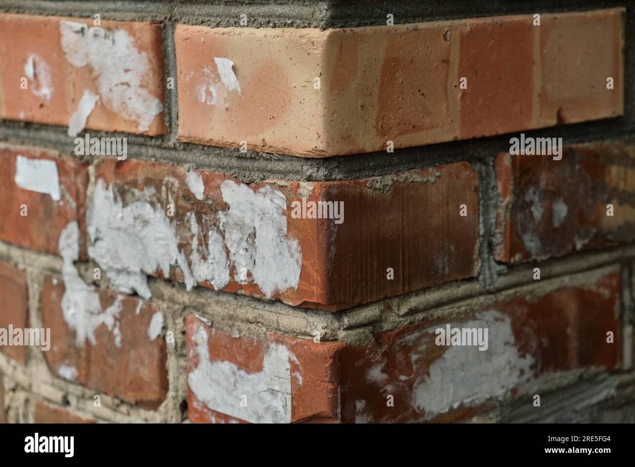 Red brick and brick edge from pillar in front of wall as texture ...