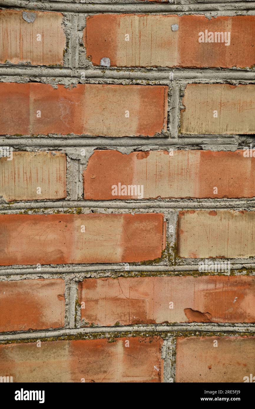 Red brick and brick edge from pillar in front of wall as texture ...