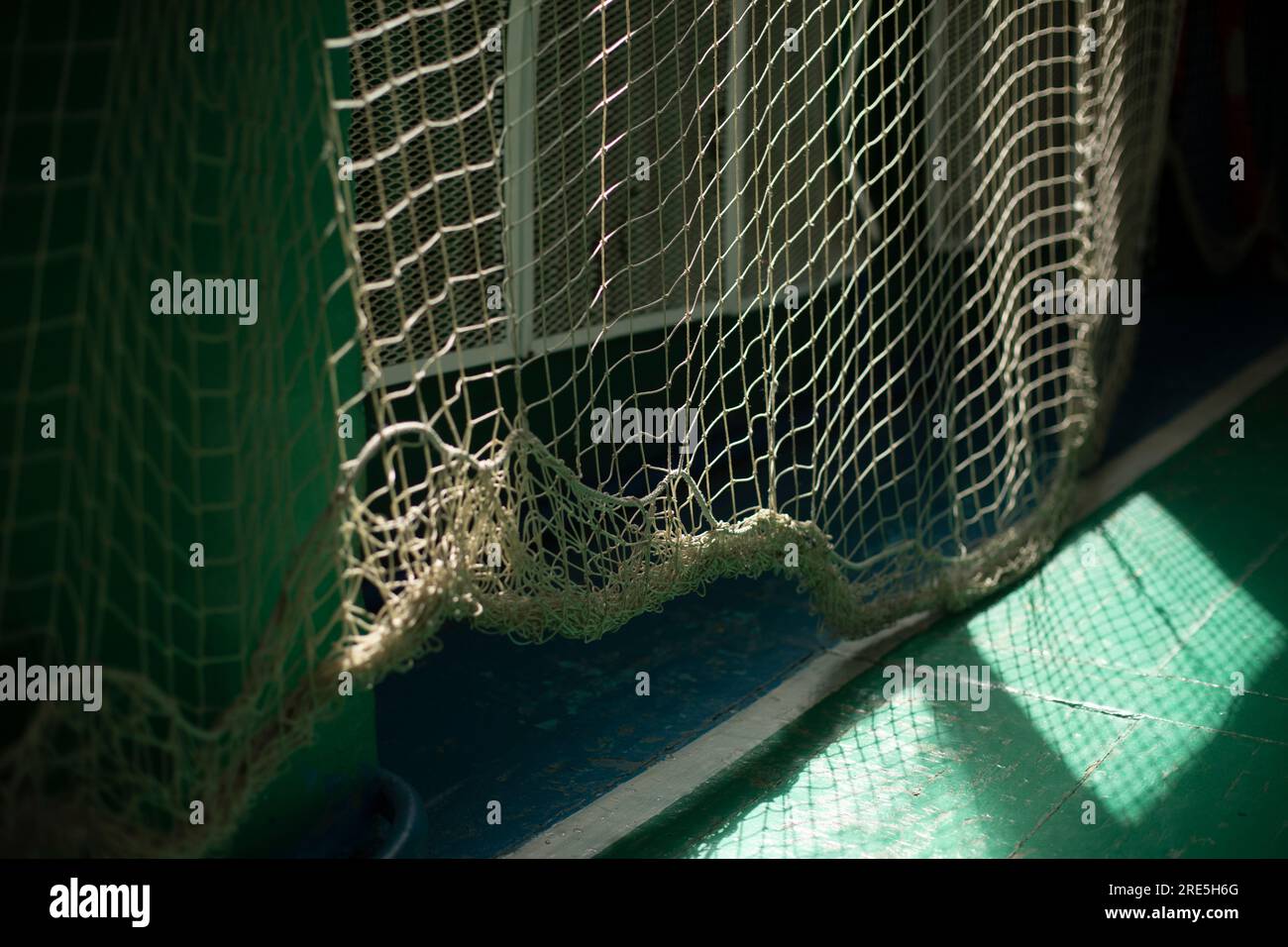 Net in gym. Mesh Details. Light in gym. Interior details Stock Photo ...