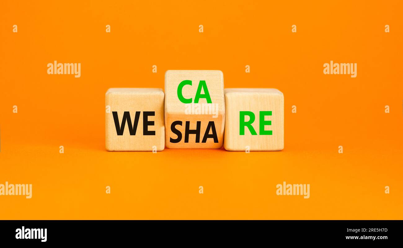 We share and care symbol. Concept word we share we care on wooden block ...