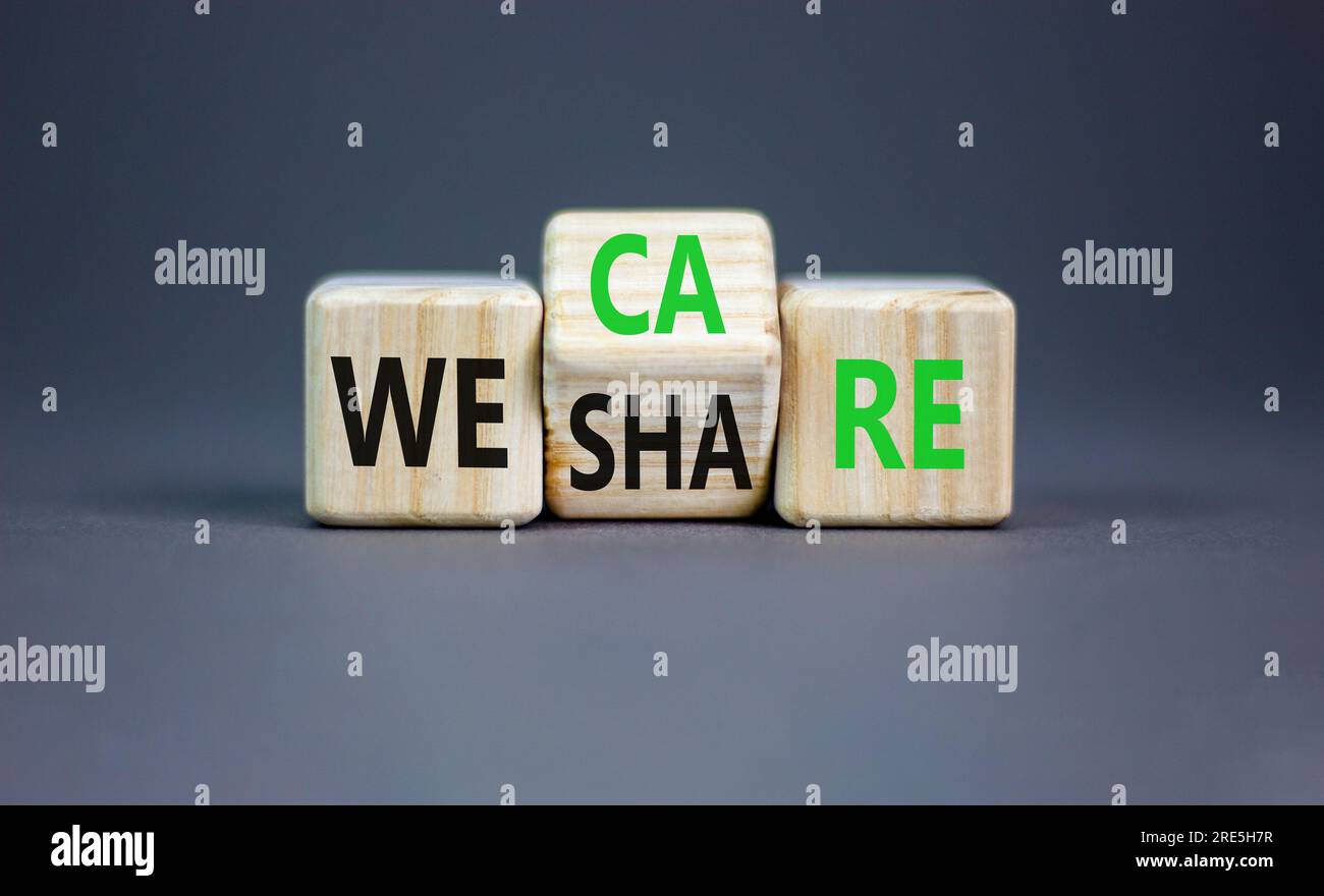We share and care symbol. Concept word we share we care on wooden block ...
