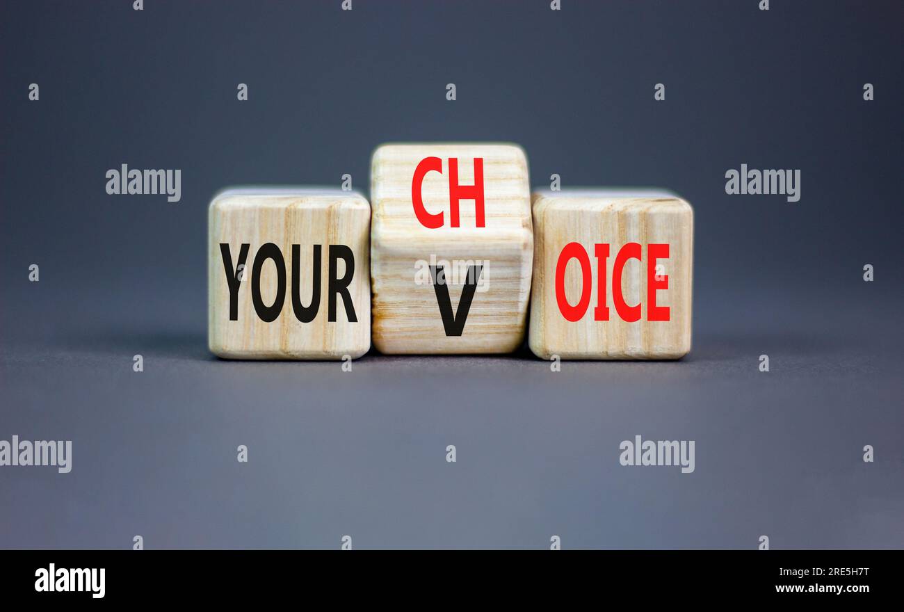 Your voice choice symbol. Businessman turns wooden cubes and changes ...