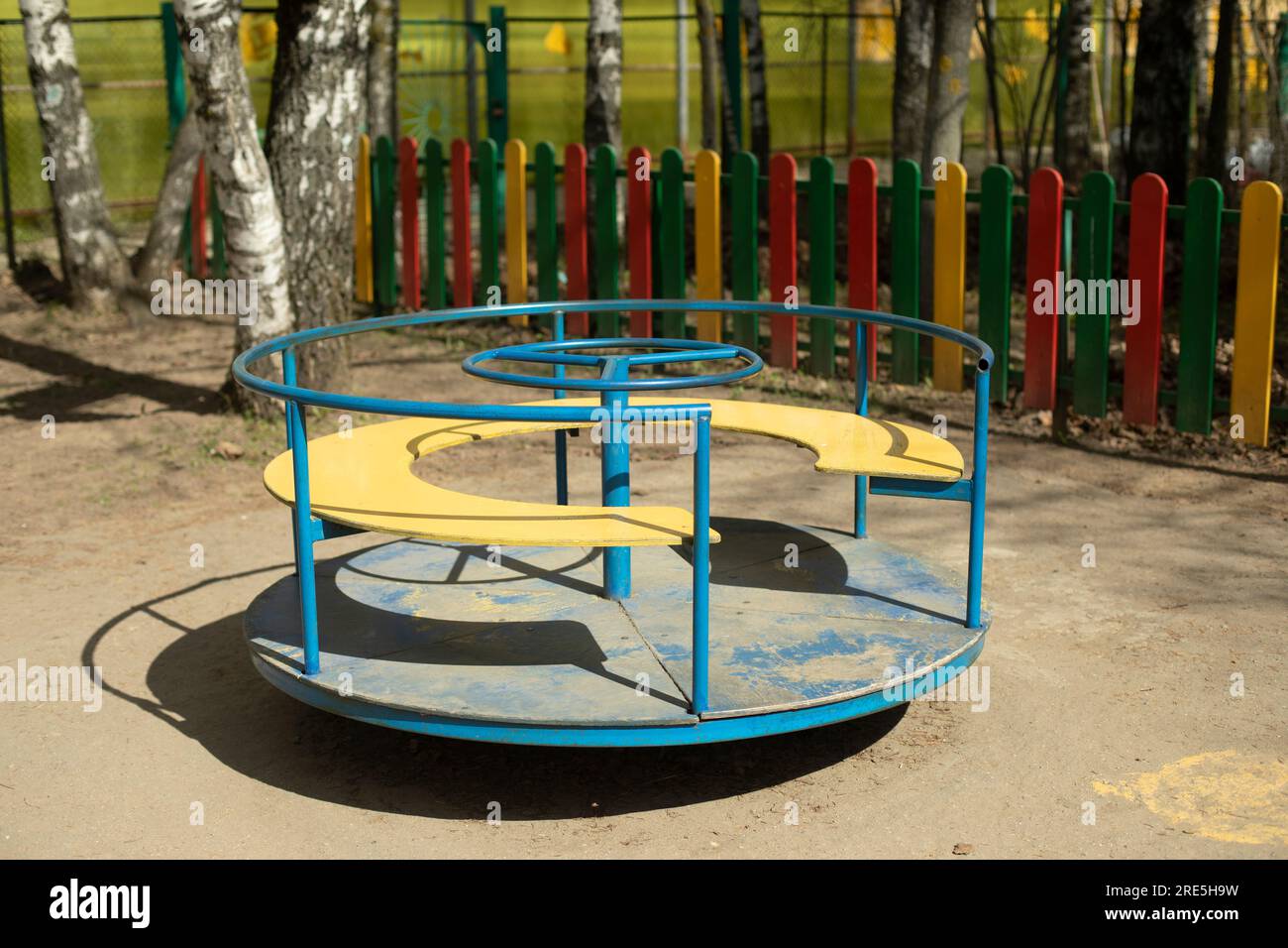 Carousel on playground. Empty playground. Attraction for toddlers. Play ...