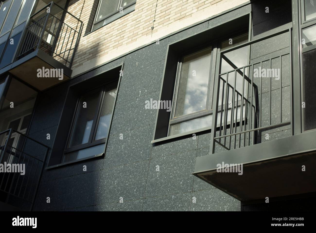 Balcony in new building. Modern residential building in detail ...